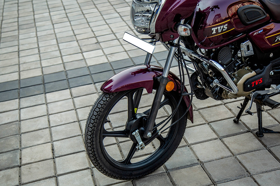 Hero Splendor Plus Xtec vs TVS Radeon: Image Comparison | BikeDekho